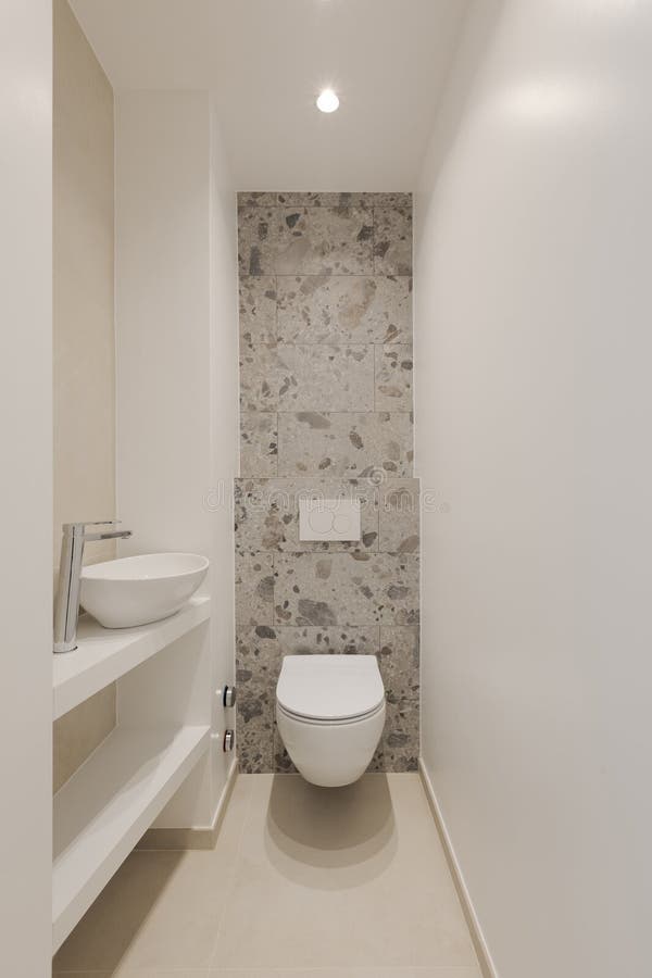 Front View of a Very Small and Narrow Toilet Stock Image - Image of ...