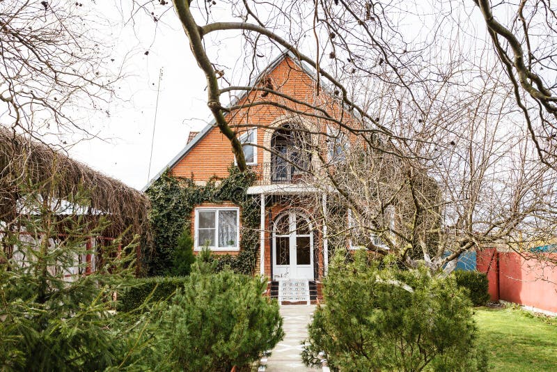 Front View of Village Cottage in Spring Stock Photo - Image of ...