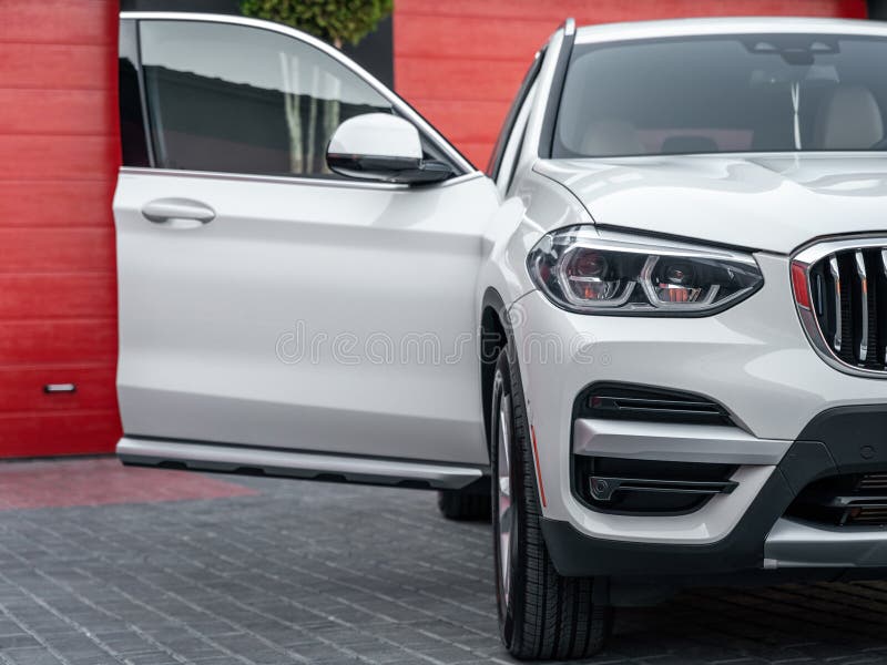 Front View of White Color Modern SUV Car with Open Passenger Front Door ...