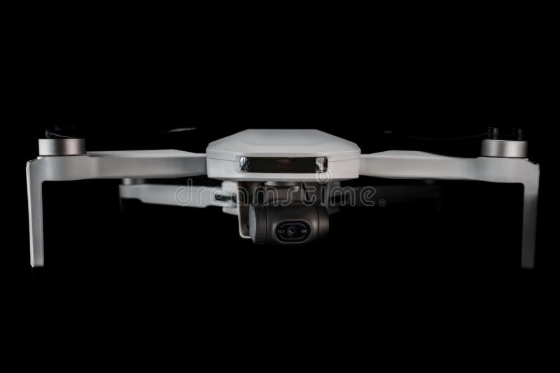 Front View of White Drone Against Black Background in Studio Lighting ...
