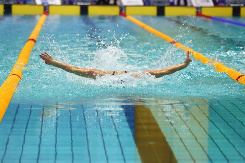 Front View of Woman Swims in a Swimming Pool Stock Image - Image of ...