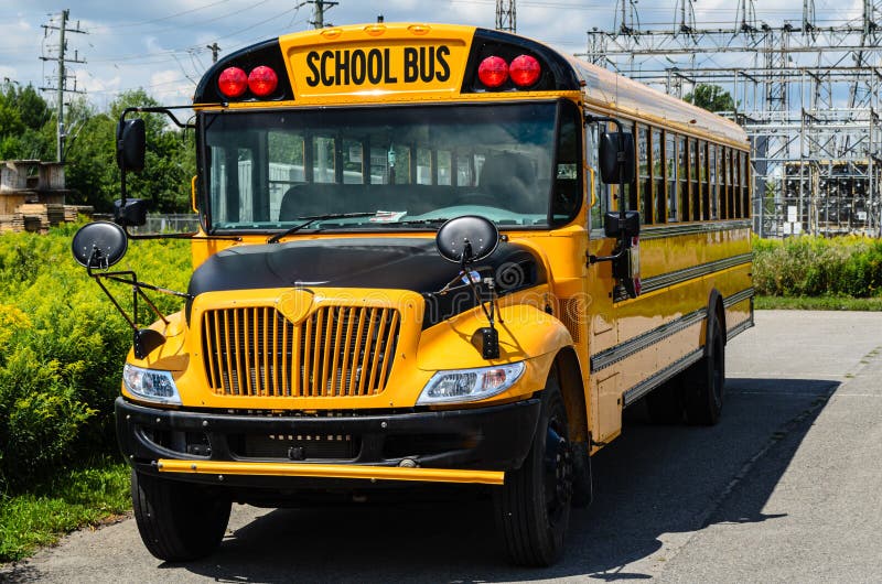 Front View of a Yellow School Bus Parked Stock Image - Image of power ...