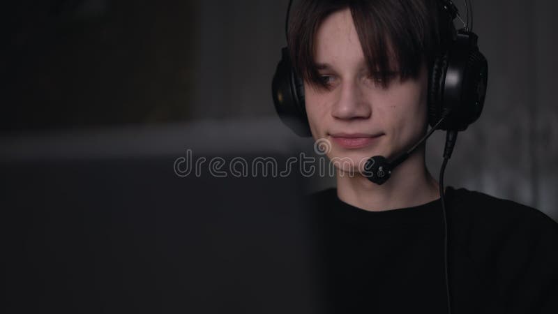 Front View of Young Computer Gamer Wearing Headphones Playing Pc Games ...