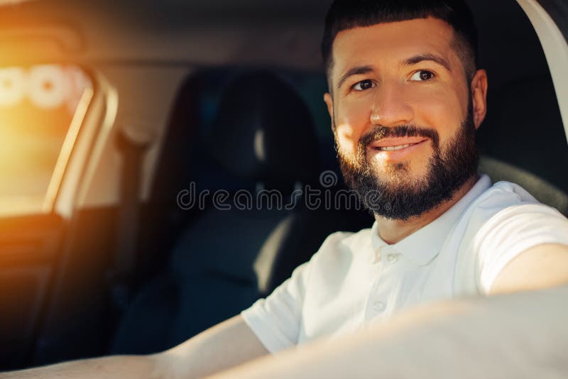 Front View, Young Handsome Man Looking Straight while Driving a Car ...