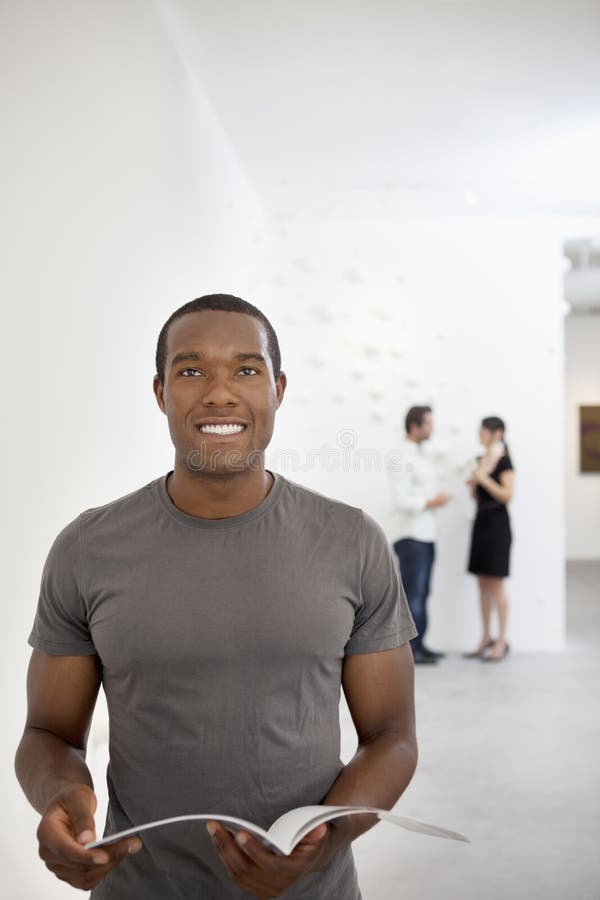 Front View of Young Man in Casual Looking Up Stock Image - Image of ...
