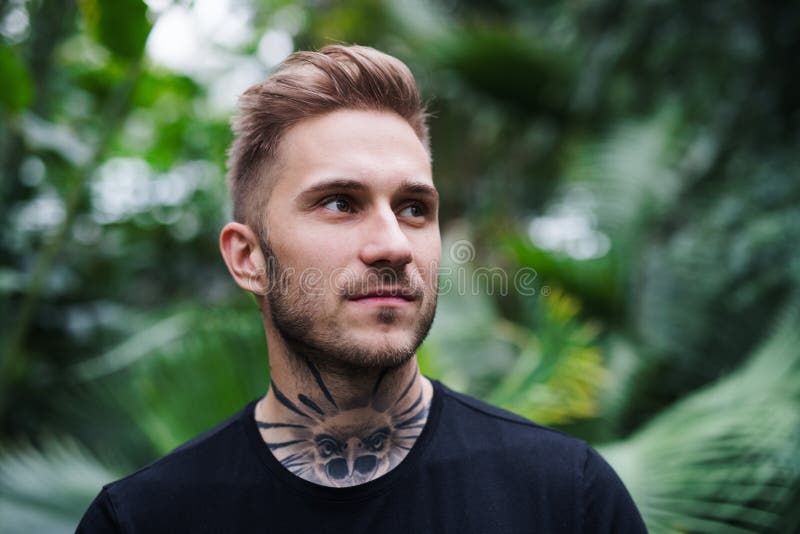 Front View of Young Man Standing in Botanical Garden. Stock Image ...
