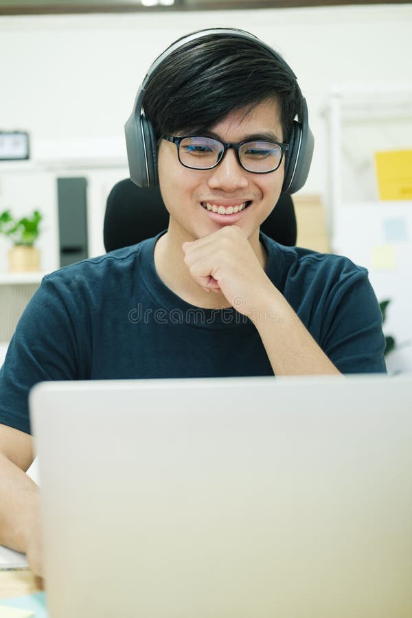 Young Man Study in Front of the Laptop Computer at Home Stock Photo ...