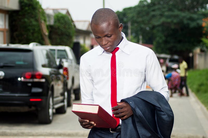 Front View of a Young Student with a Book. Stock Image - Image of ...
