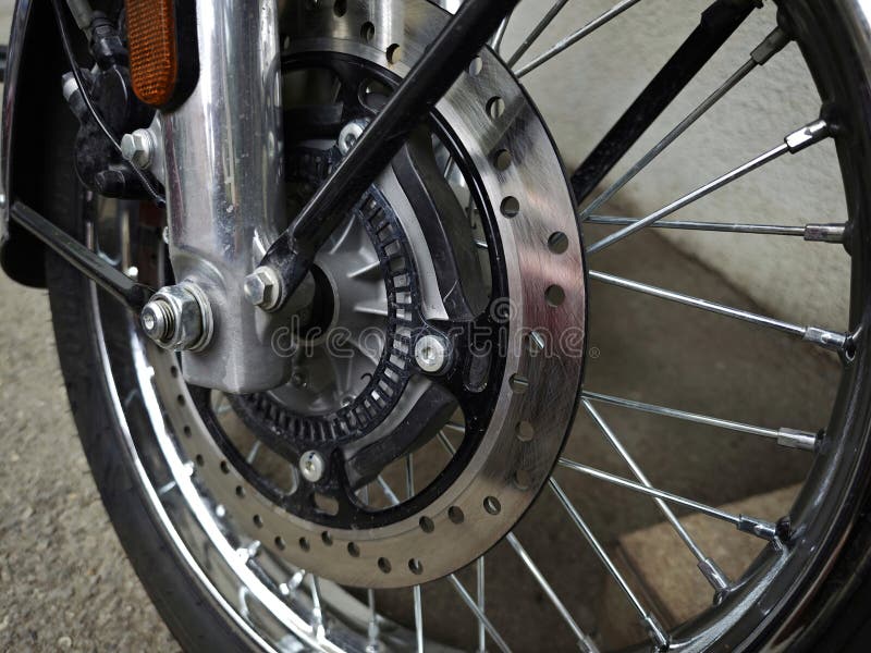 Front Wheel of Motorcycle Featuring Brake Disc and Spokes Stock Image ...