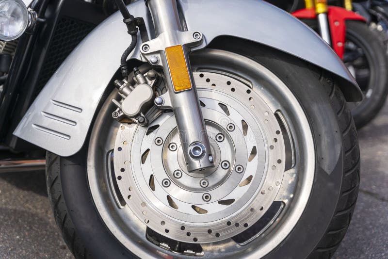 The Front Wheel of a Motorcycle, a Side View of the Front Wing of a ...