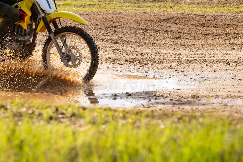 Front wheel in the mud stock photo. Image of sand, dirt - 305458810