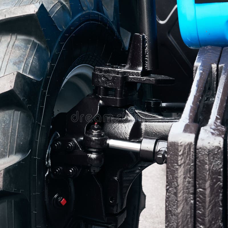 The Front Wheel of the Tractor. Tie Rod Stock Image - Image of drive ...