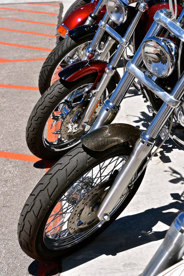 Row of parked motorcycles editorial photography. Image of tire - 118748387