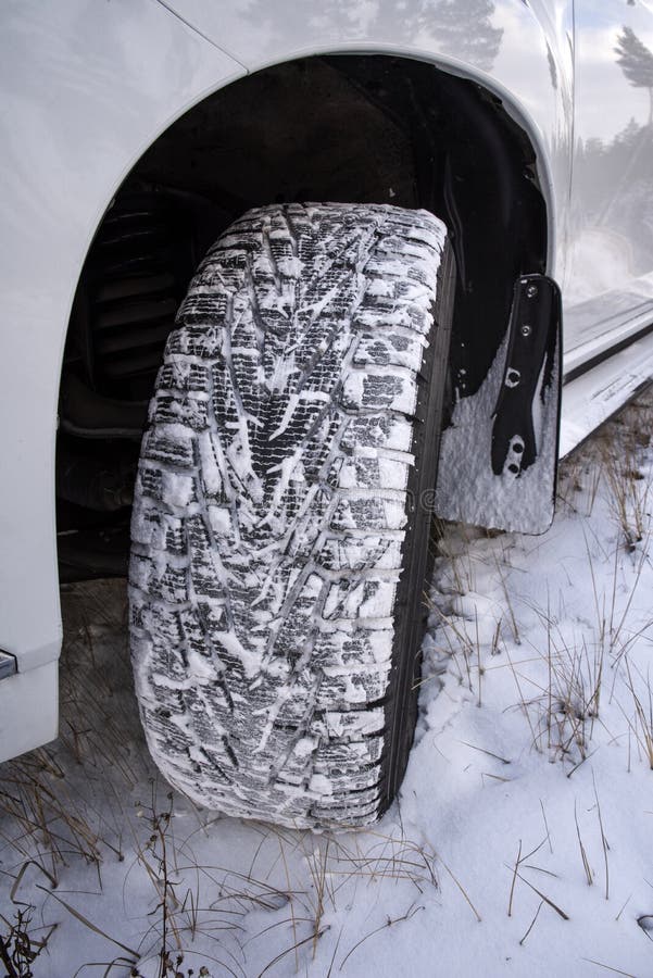 Front Winter Studded Car Wheel on Snow Stock Photo - Image of frost ...