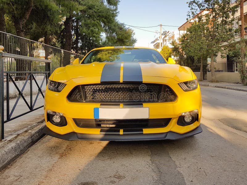 Front of a Yellow Sport Car with Black Stripes. Stock Image - Image of ...