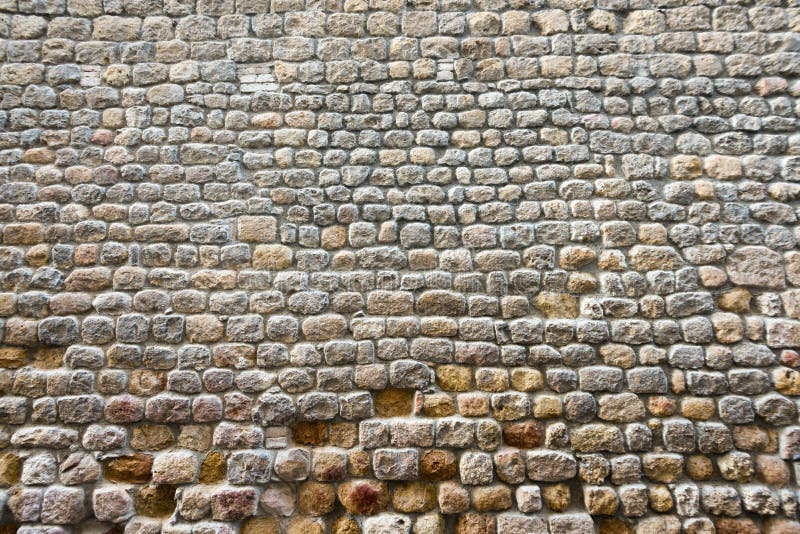 Frontal View of a Broken Textured Ancient Stone Wall Stock Photo ...