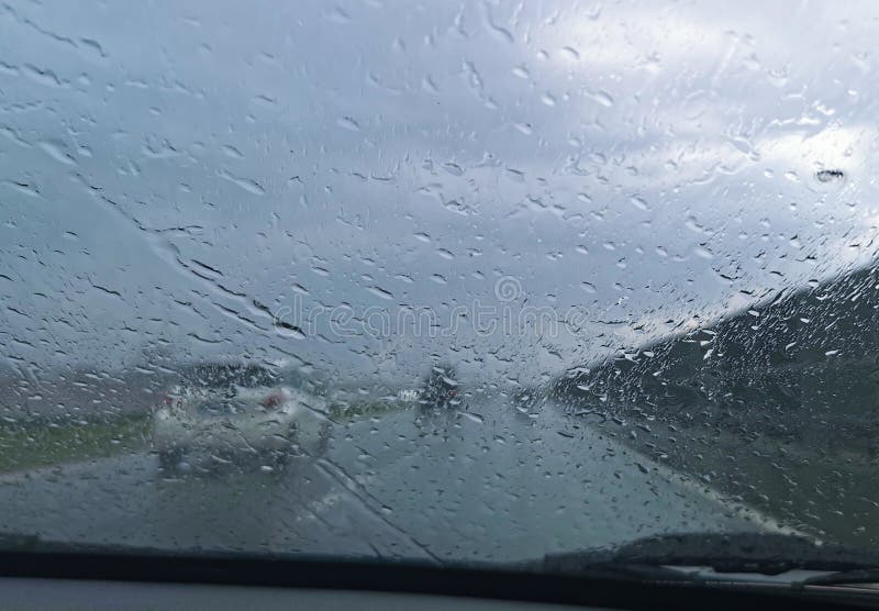 Frontal View Looking through a Car Windshield during Rain Storm Stock ...
