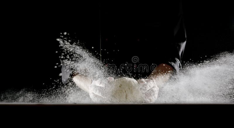 Frontal View of Man Dropping Dough Onto Table Stock Photo - Image of ...