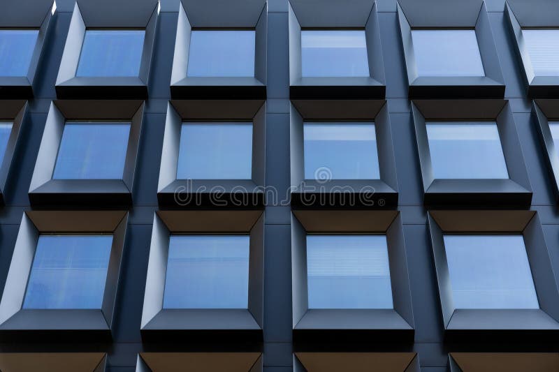 Frontal View of Modern Building with Square Windows in Rhythmic Surface ...
