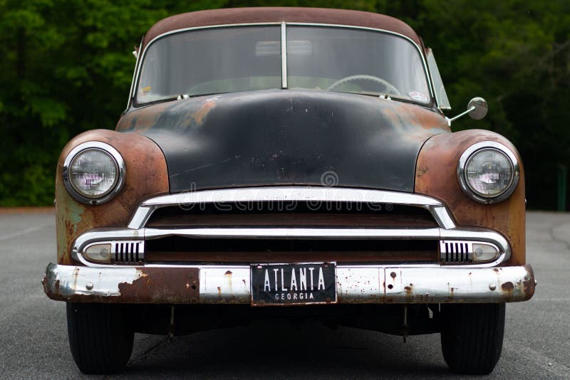 Frontal View of an Old Rusty Chevrolet Deluxe with Atlanta Plate ...