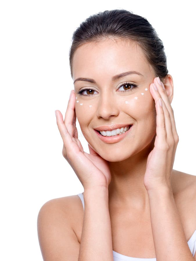 Fronte Della Donna Sorridente Con Crema Su Esso Fotografia Stock ...