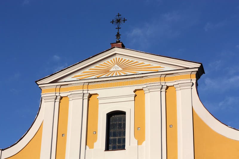 Fronton of the Catholic Church Stock Photo - Image of city, orange ...