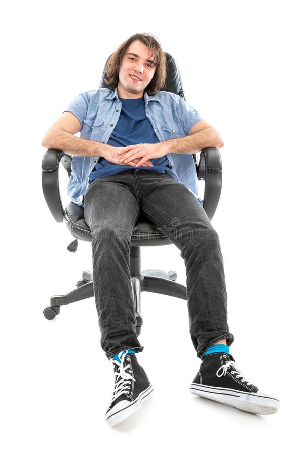 Frontview of Lazy Man Sitting Stretched Out in an Armchair Stock Image ...