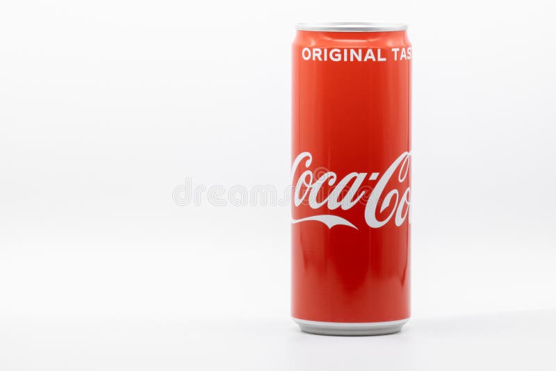 A Frontview Shot of a Red Coca Cola Can on a White Surface with Space ...