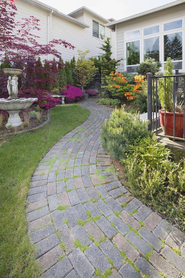 Frontyard Cement Stone Paver Path Vertical Stock Image - Image of water ...
