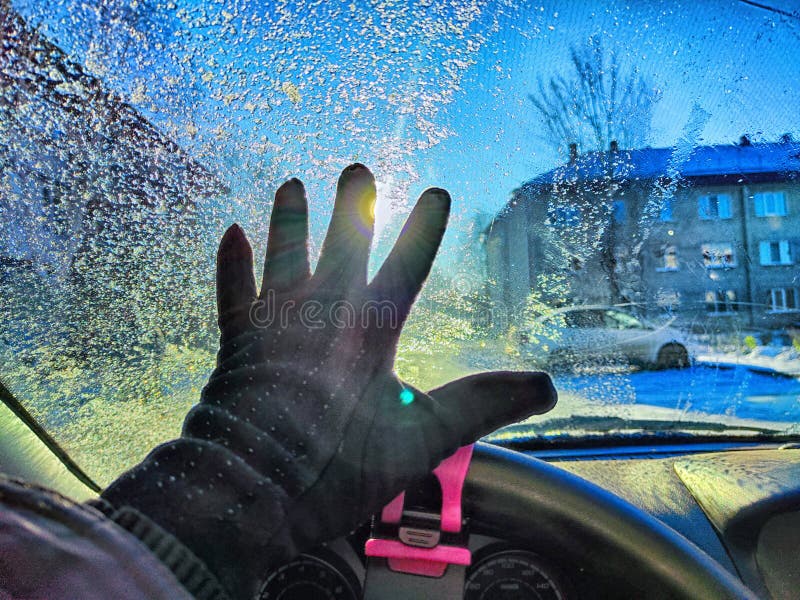 Frost on the Glass. Poor Visibility. Difficulties and Dangers of ...