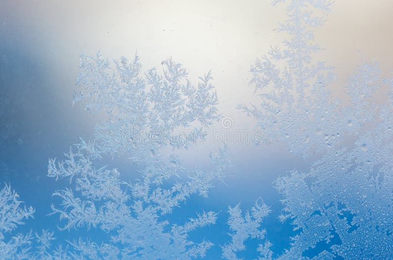 Frost Patterns on Window Glass. Cold Winter Background Stock Photo ...