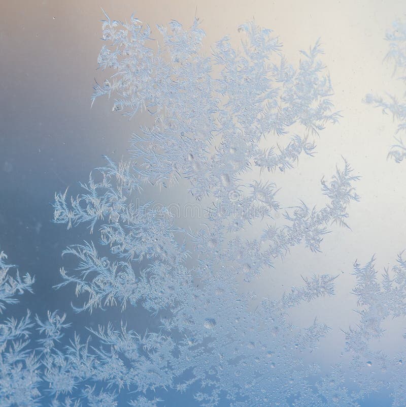 Frost Patterns on Window Glass. Cold Winter Background Stock Photo ...