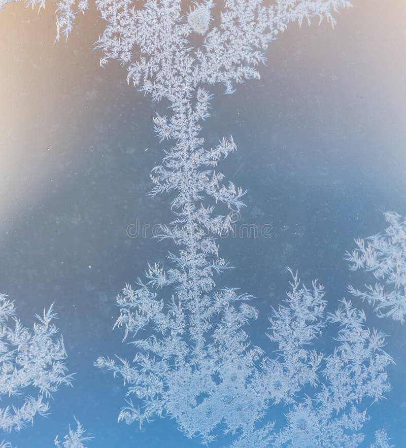 Frost Patterns on Window Glass. Cold Winter Background Stock Photo ...