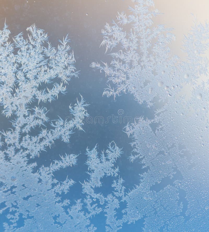 Frost Patterns on Window Glass. Cold Winter Background Stock Image ...