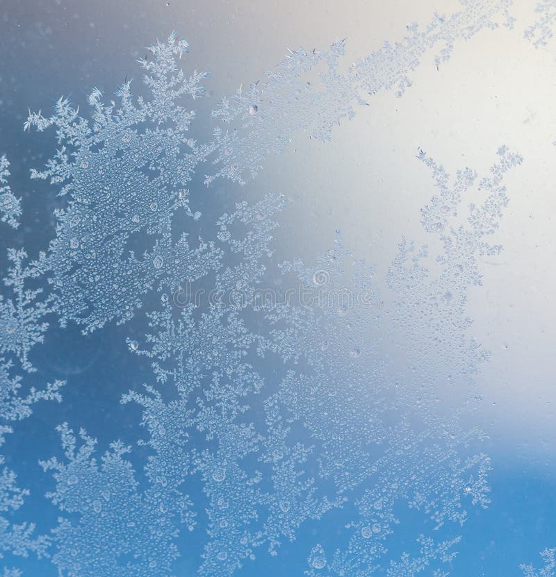 Frost Patterns on Window Glass. Cold Winter Background Stock Photo ...