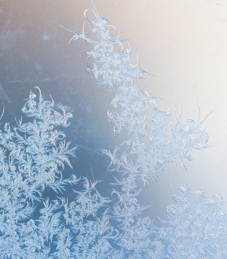 Frost Patterns on Window Glass. Cold Winter Background Stock Image ...