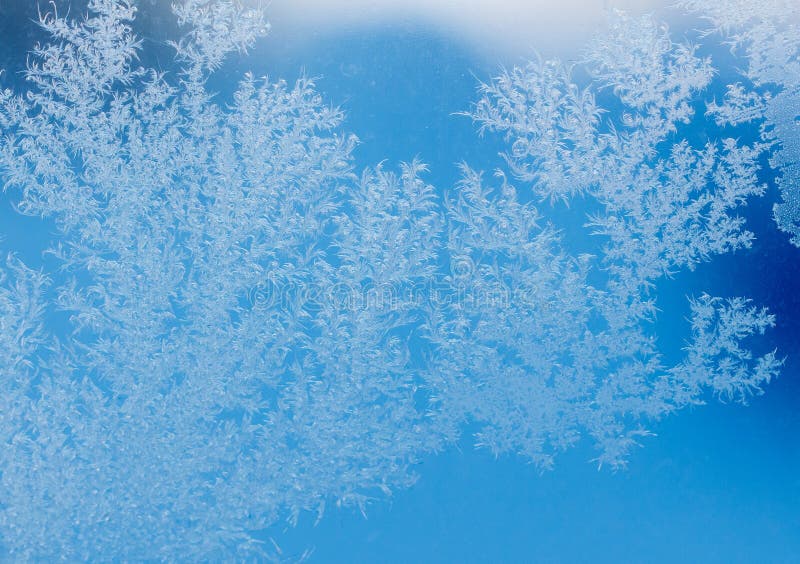 Frost Patterns on Window Glass. Cold Winter Background Stock Image ...