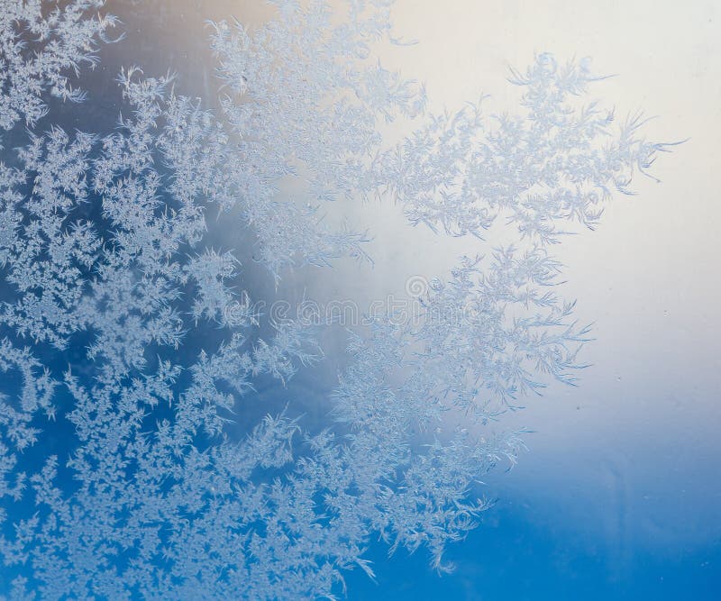 Frost Patterns on Window Glass. Cold Winter Background Stock Image ...