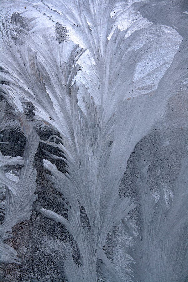 Frosted designs on glass stock image. Image of season - 17025779