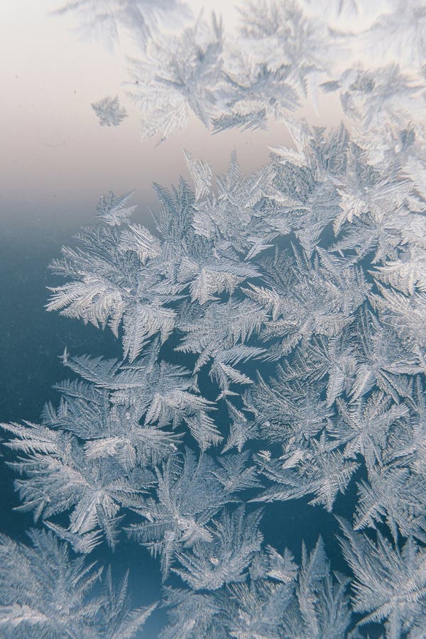 Frosty Natural Pattern on the Winter Window. the Texture of Ice on ...
