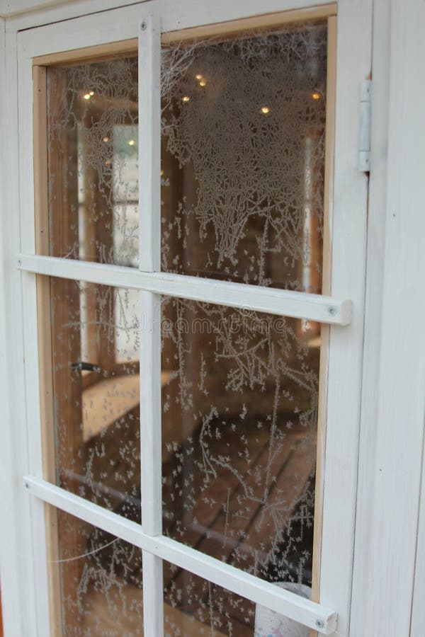 Frosty Pattern on a White Window Stock Photo - Image of frame, white ...