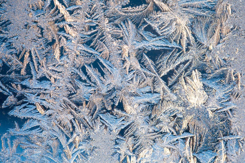 Frosty Pattern on a Window on a Blue Background Stock Image - Image of ...
