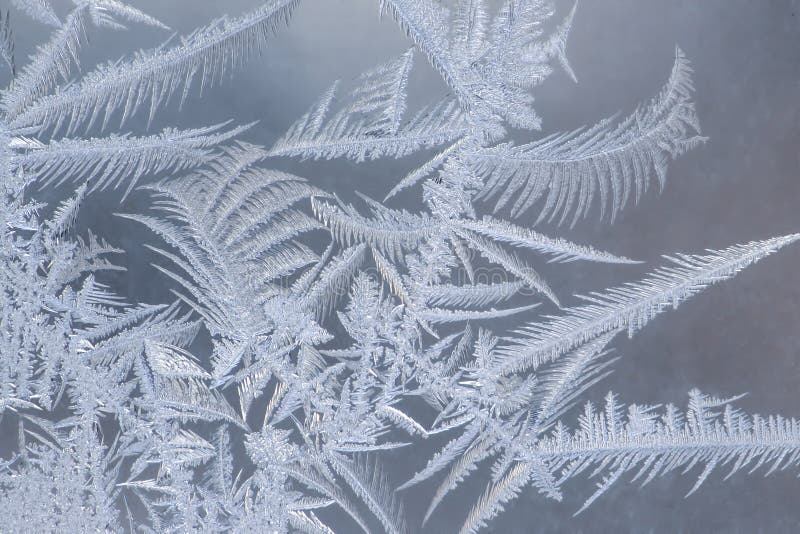 Frosty Patterns on the Window Glass Closeup. Natural Textures and ...