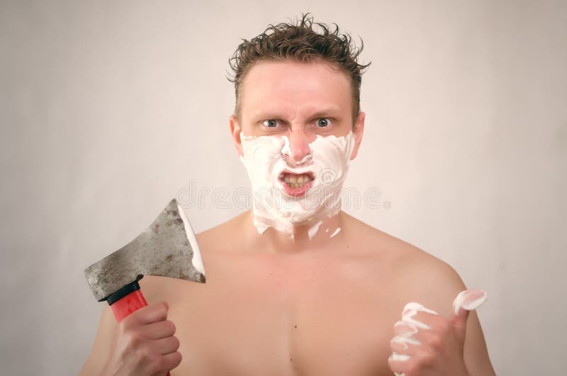 Man shaving by axe. stock image. Image of shows, thumb - 129354797