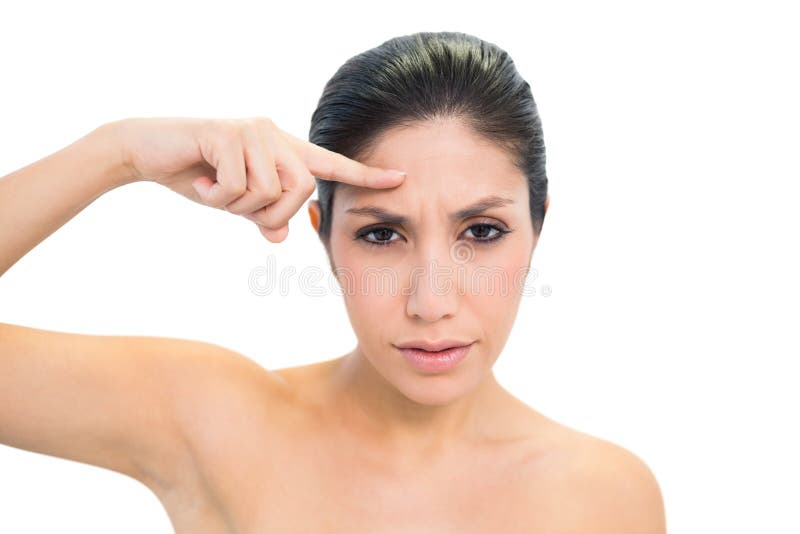 Natural Beauty Pointing Forehead Stock Photos - Free & Royalty-Free ...