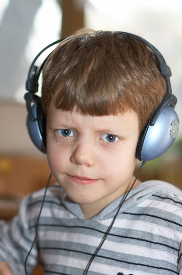 Frowning child stock image. Image of earphones, happy, pretty - 644875