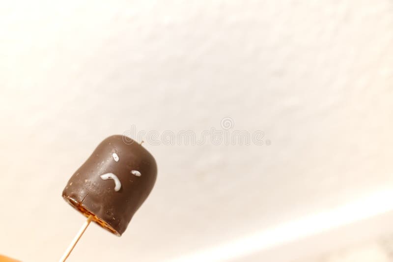 Frowning Chocolate Marshmallow on Toothpick Stock Photo - Image of ...