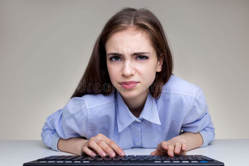 Frowning Female Using Keyboard Stock Photo - Image of information ...