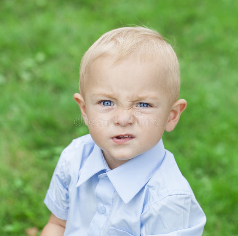 Frowning infant boy stock image. Image of little, head - 120495129