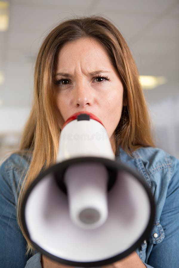 Frowning Woman Speaking through Loud Speaker Stock Photo - Image of ...